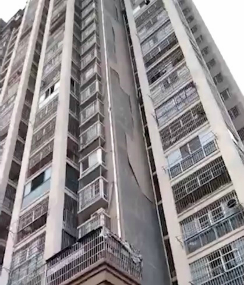 Boy Narrowly Escapes Death as Huge Concrete Slabs Fall From Building ...