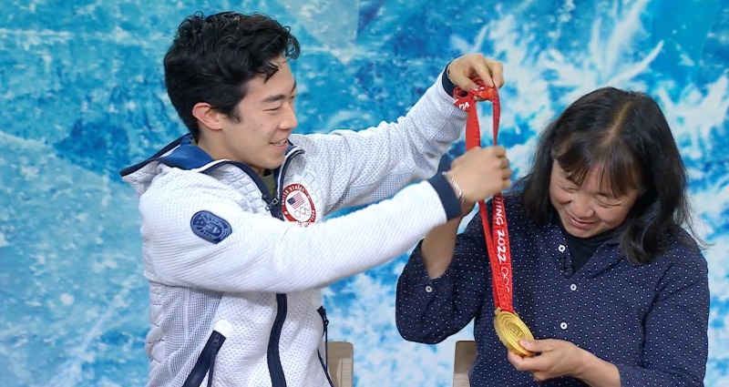 Nathan Chen places his gold medal around his mother’s neck in their ...