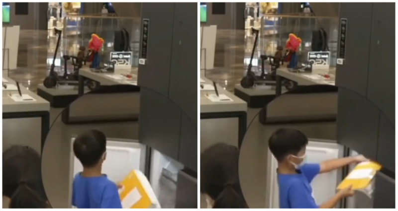 Chinese boy is caught on video trying to hide homework in display ...