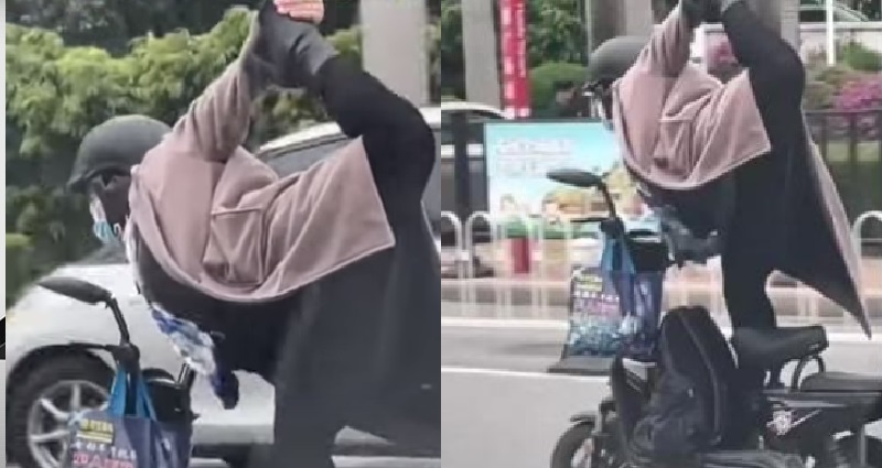 Chinese woman filmed flexing on other drivers with yoga poses while riding motorcycle