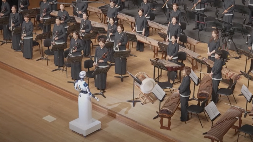 ‘Robots and humans can coexist’: Robot conducts orchestra for the first ...